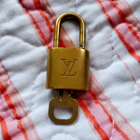 Louis Vuitton | Bags | Authentic Louis Vuitton Lock | Poshmark